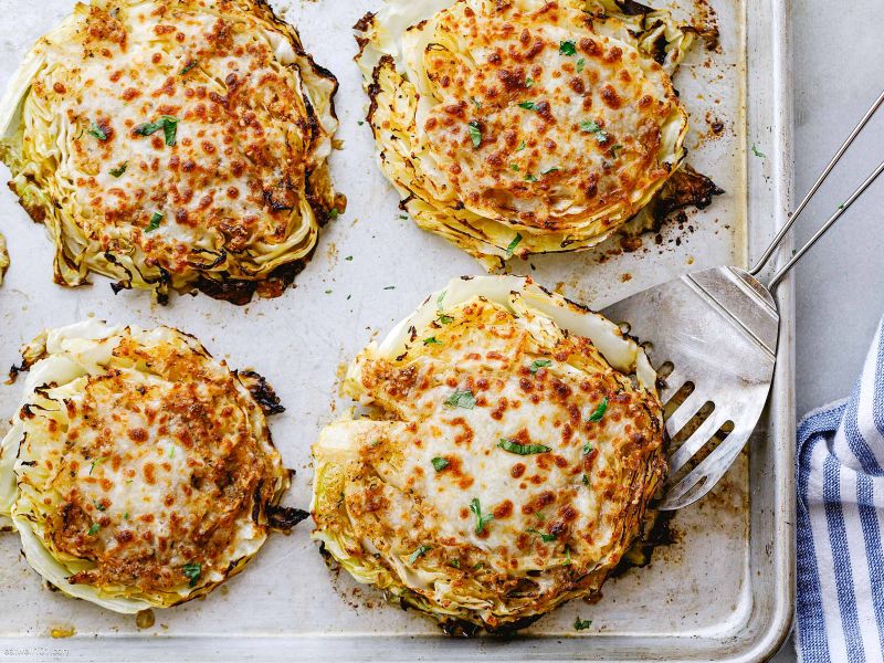 Cheesy Baked Cabbage Steaks Recipe – How to Roast Cabbage Steaks ...