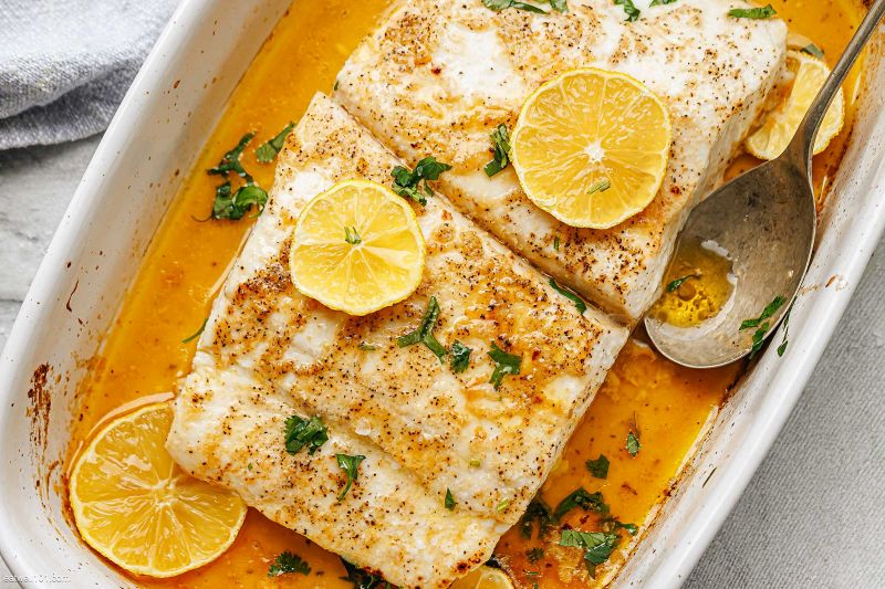 Baked Fish Recipe with Lemon Garlic Butter Sauce — Eatwell101